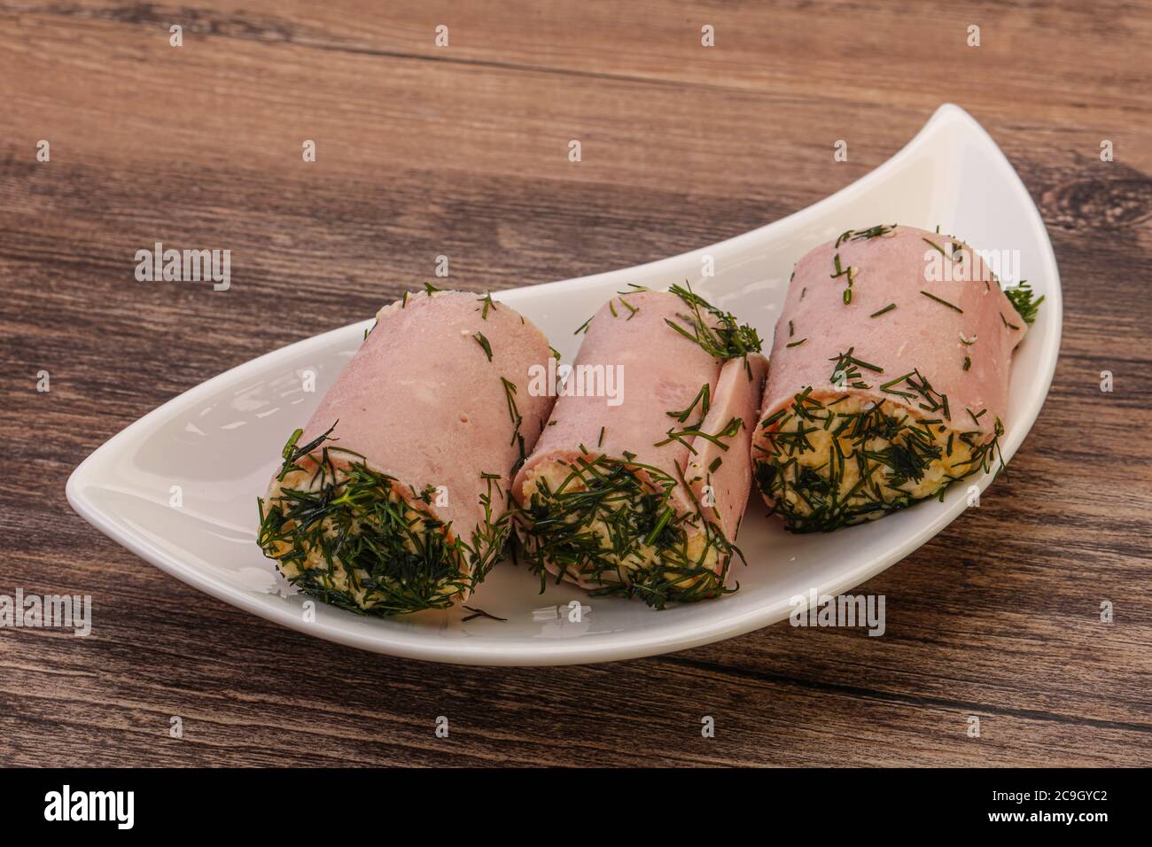 Ham roll snack with cheese and garlic Stock Photo - Alamy