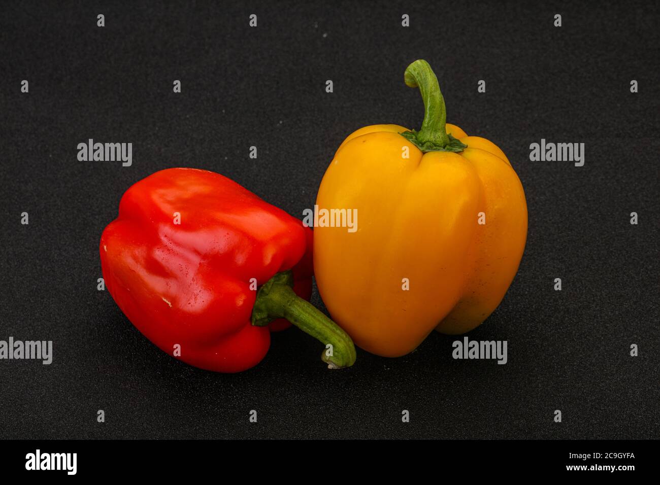 Two Ripe sweet Bulgarian bell peppers Stock Photo - Alamy