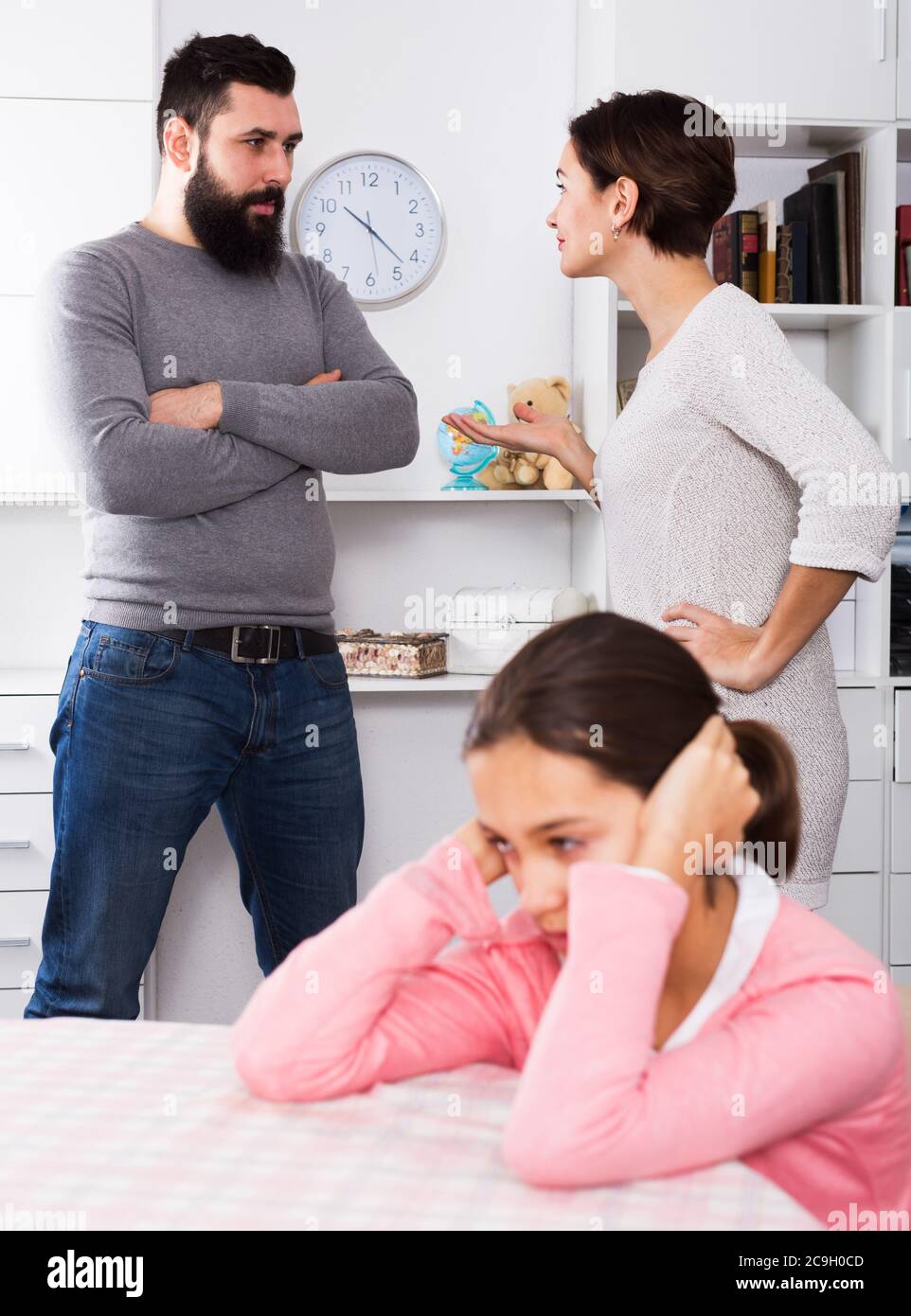 Parents Arguing With Teenager Listening High Resolution Stock ...
