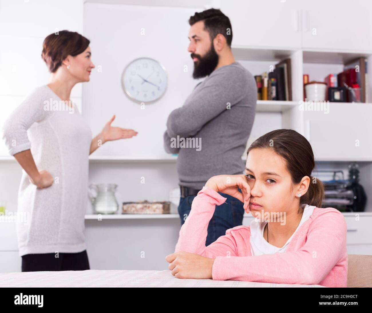 Parents Arguing With Teenager Listening High Resolution Stock ...
