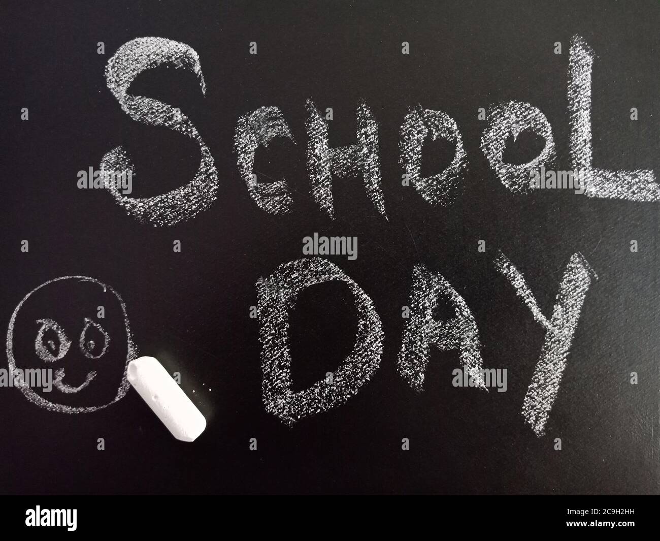 School Day cartoon word presented on chalkboard with school educational ...