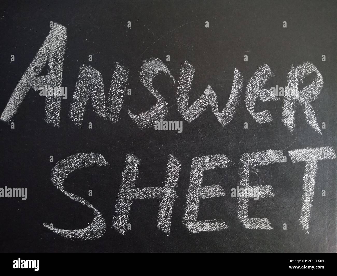 Answer sheet word presented on chalkboard with school educational ...