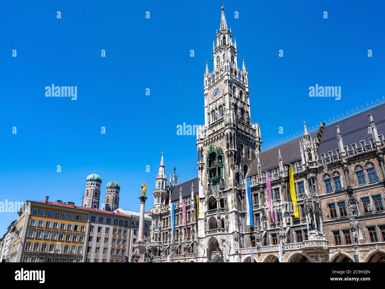 New town hall with Marian column and steeples of the Church of Our Lady ...