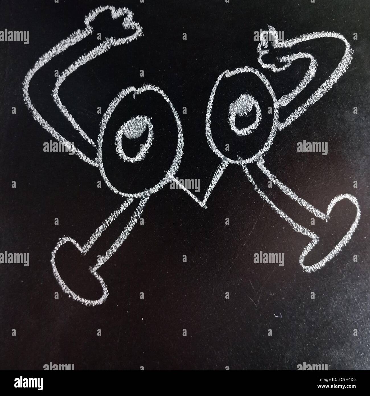 Funny walking eyes cartoon art drawing on chalkboard for kid education ...