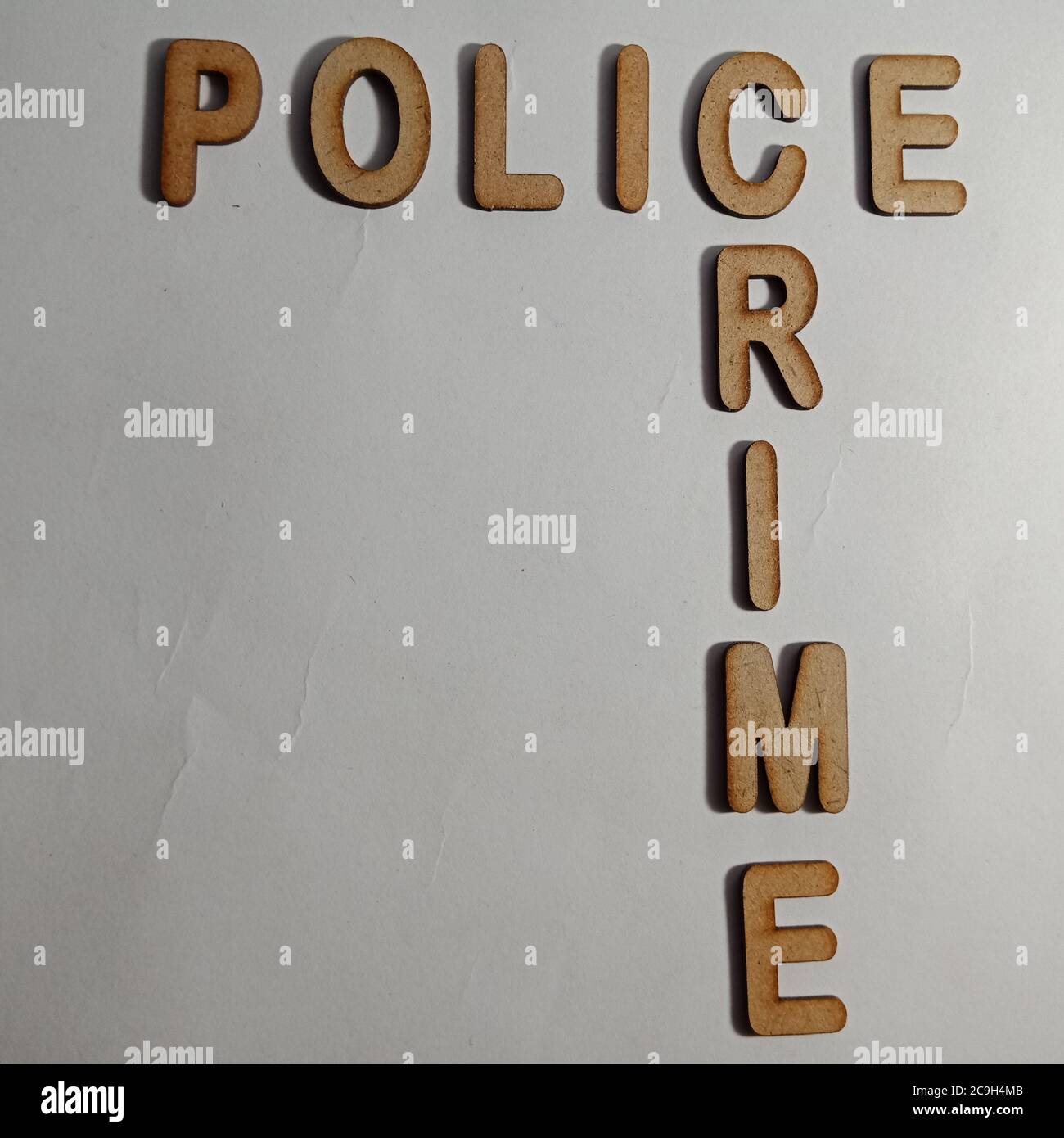 Police crime cross word business terminology presented on white ...