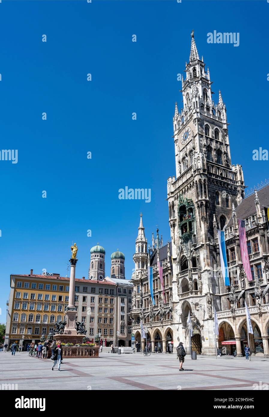 New town hall with Marian column and steeples of the Church of Our Lady ...