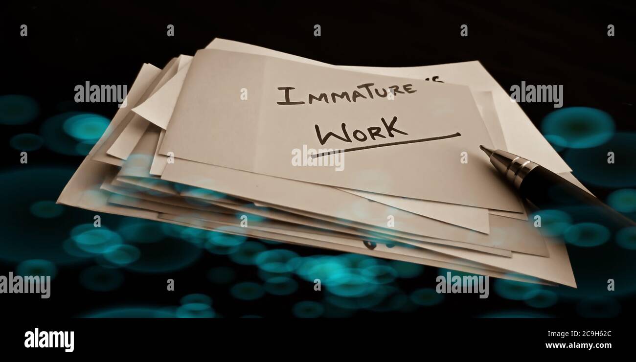 immature-work-word-with-hand-written-concept-on-colorful-paper-slip-pattern-style-displayed-on