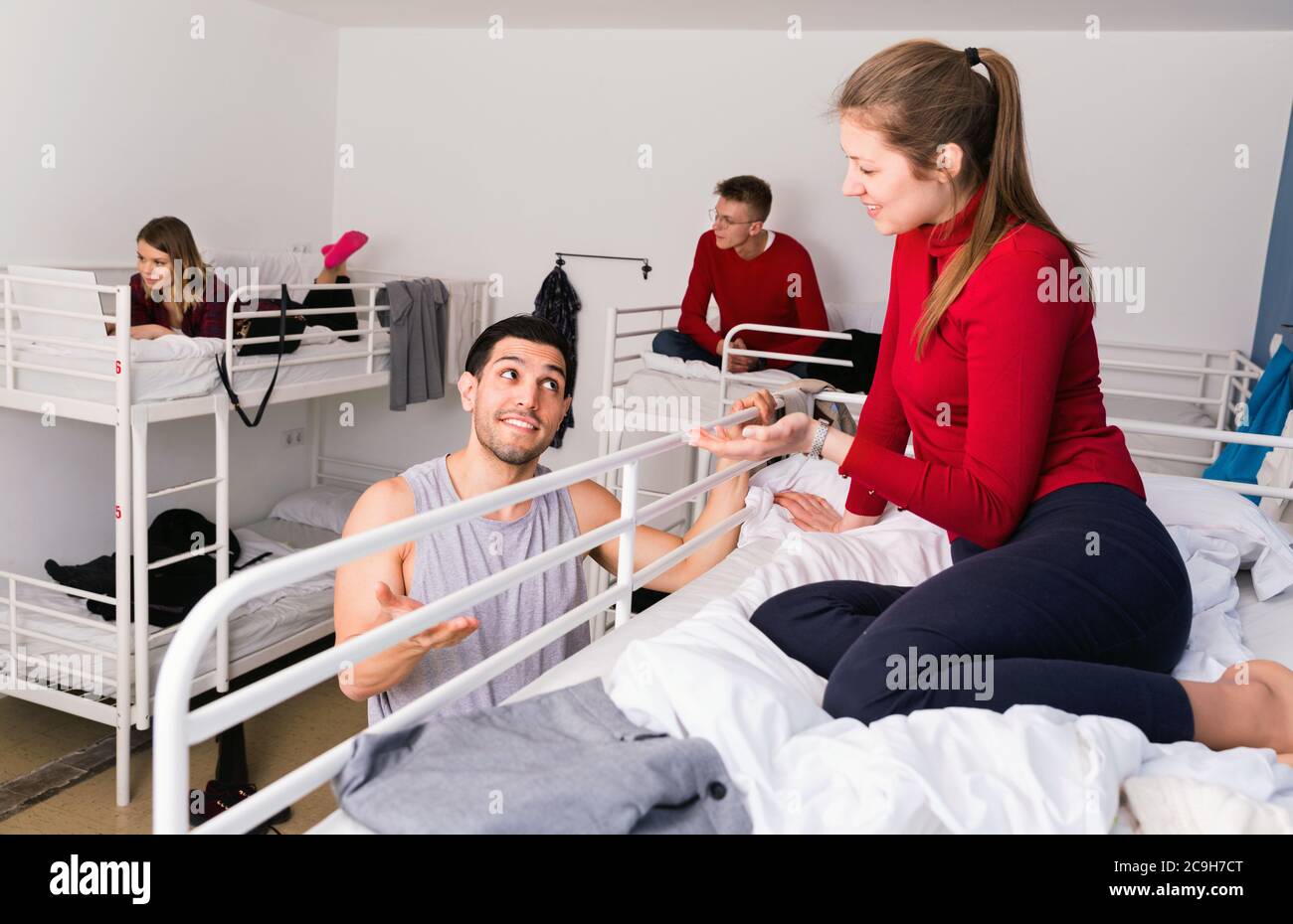Handsome cheerful positive smiling man talking and flirting with ...
