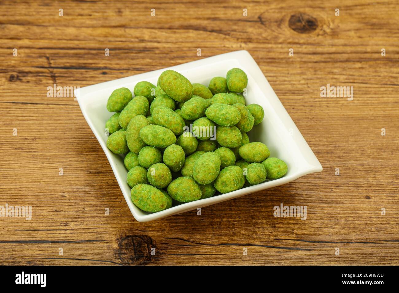 Spicy wasabi peanuts snack in the bowl Stock Photo - Alamy