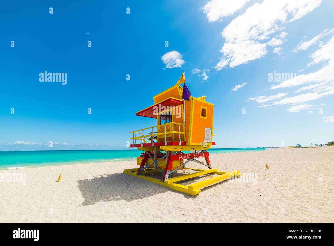 Colorful lifeguard tower under a clear sky in Miami Beach. Southern ...