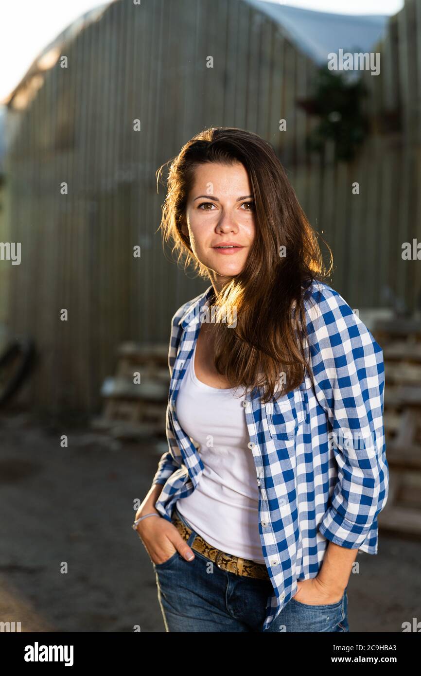 Portrait of lovely farmer woman in the backyard of village house Stock ...