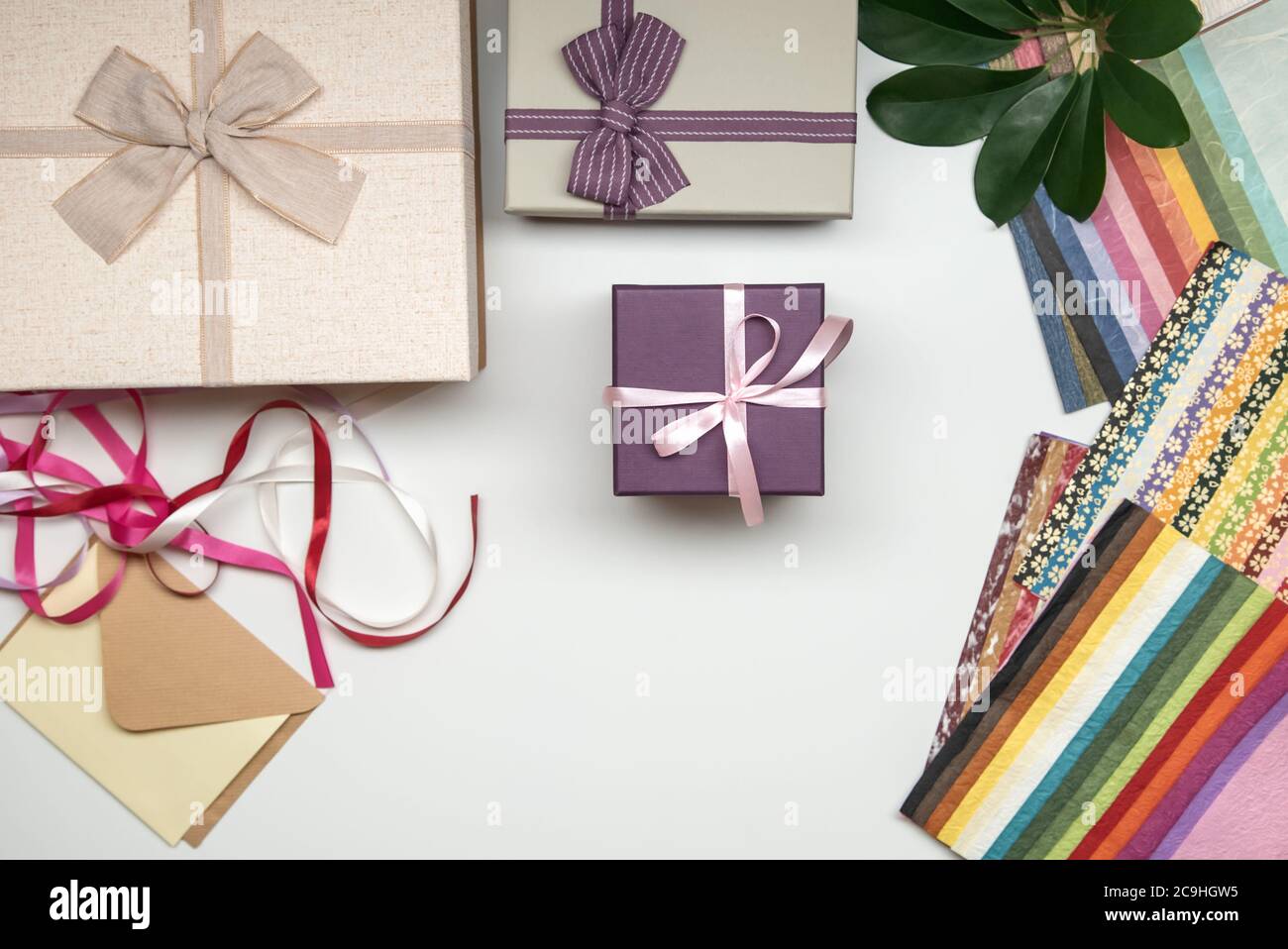 All things for gift wrapping on white background. Present box with bow ...