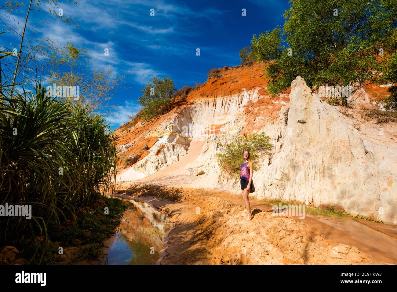 Beautiful smiling caucasian young woman in the park of Fairy Springs ...