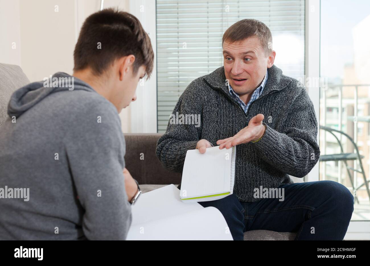 Father scolding son hi-res stock photography and images - Alamy