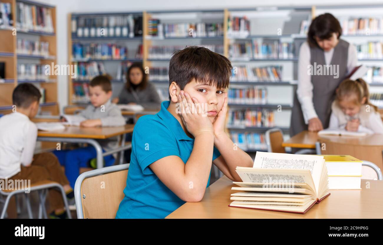 Tired school boy sad hi-res stock photography and images - Alamy