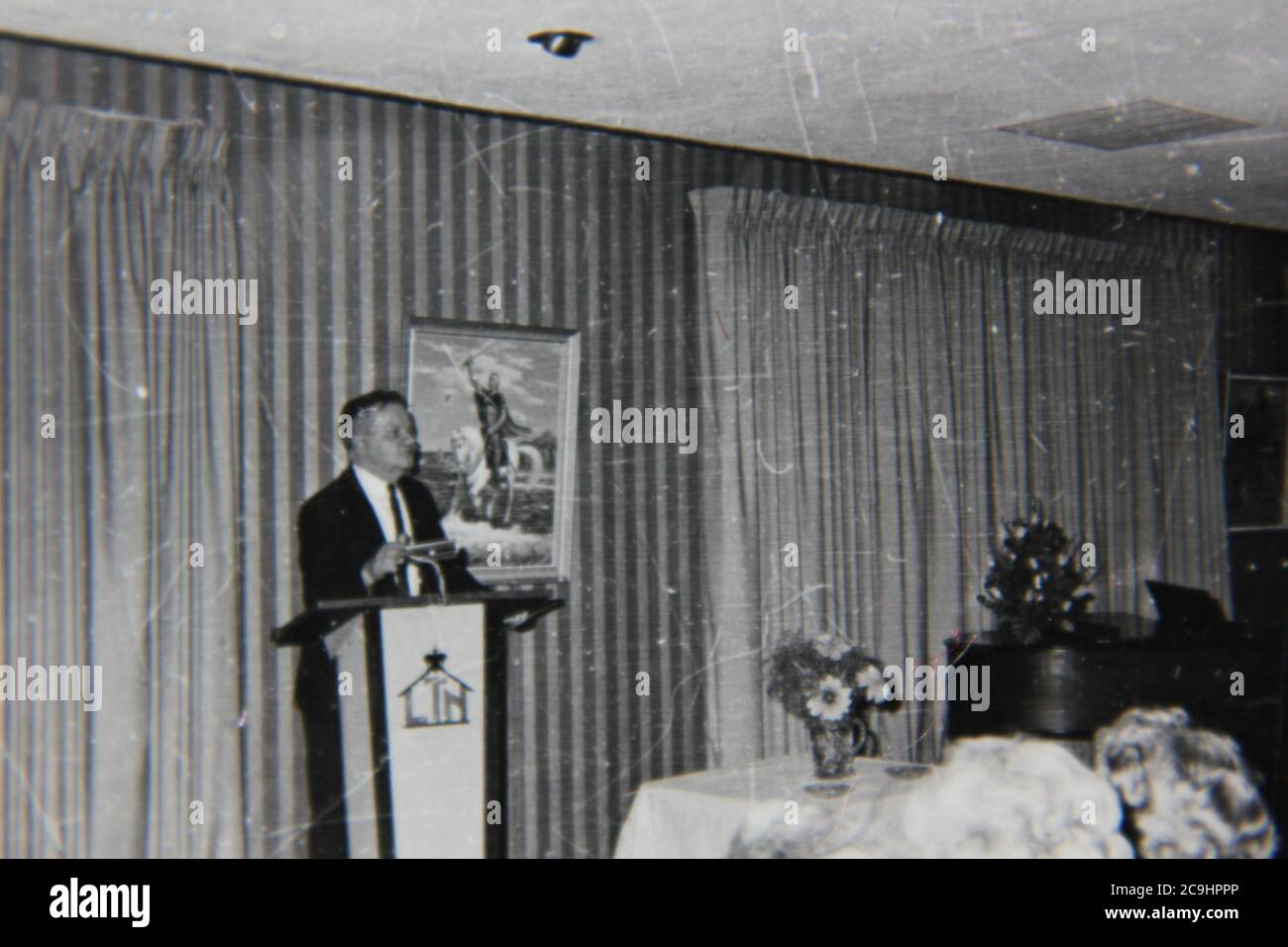 Fine 1970s vintage black and white photography of an adult speaker ...