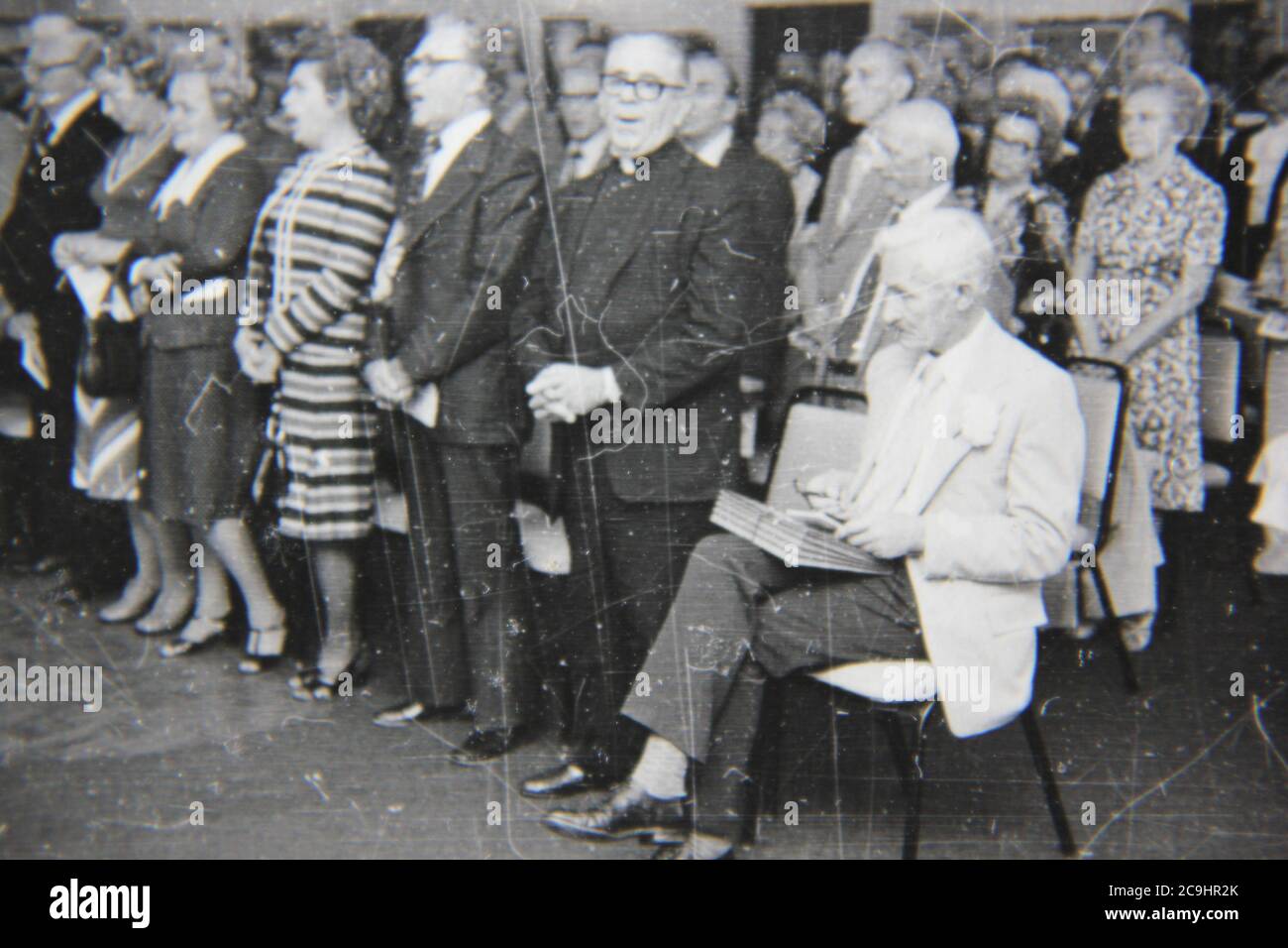 Fine 1970s vintage black and white photography of a regular audience ...