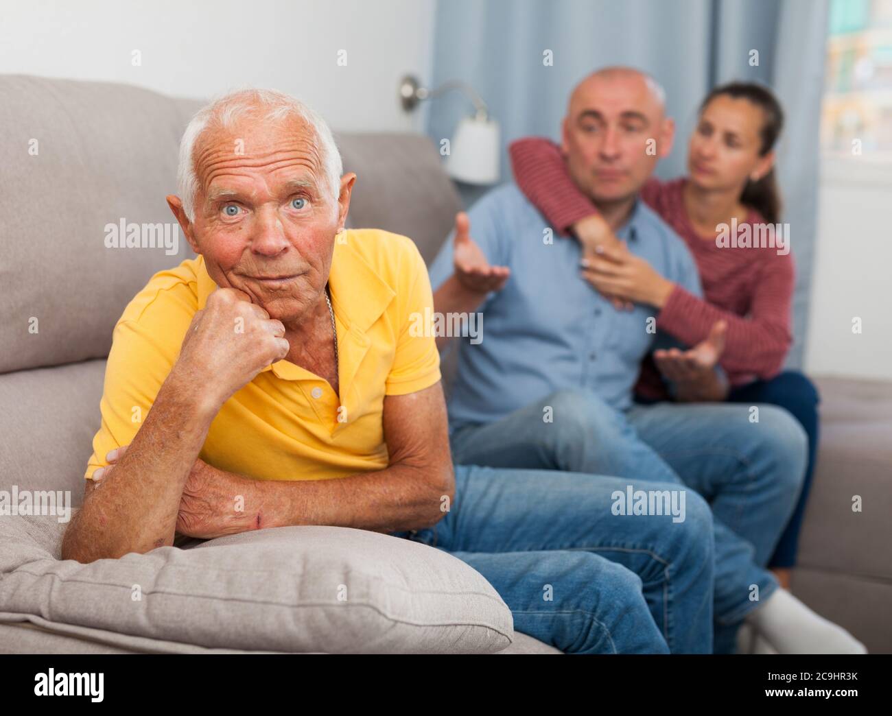 Home quarrel between father and adult children Stock Photo - Alamy
