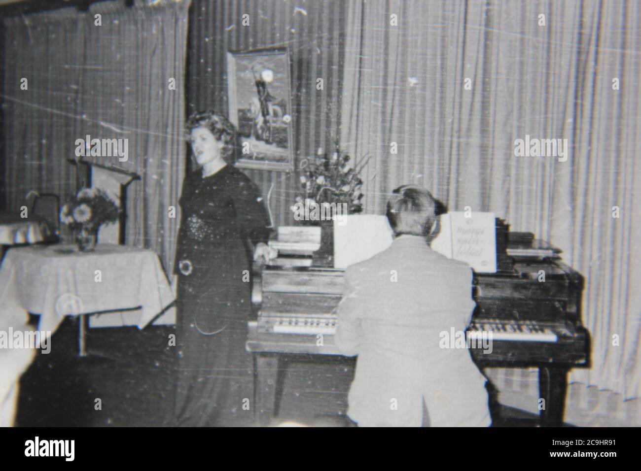 Fine 1970s vintage black and white photography of a lady singer giving ...