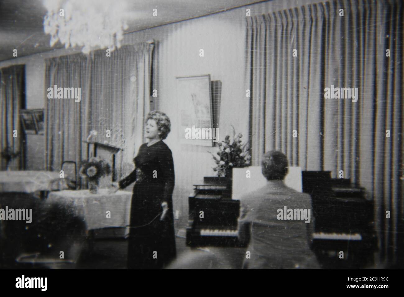 Fine 1970s vintage black and white photography of a lady singer giving ...