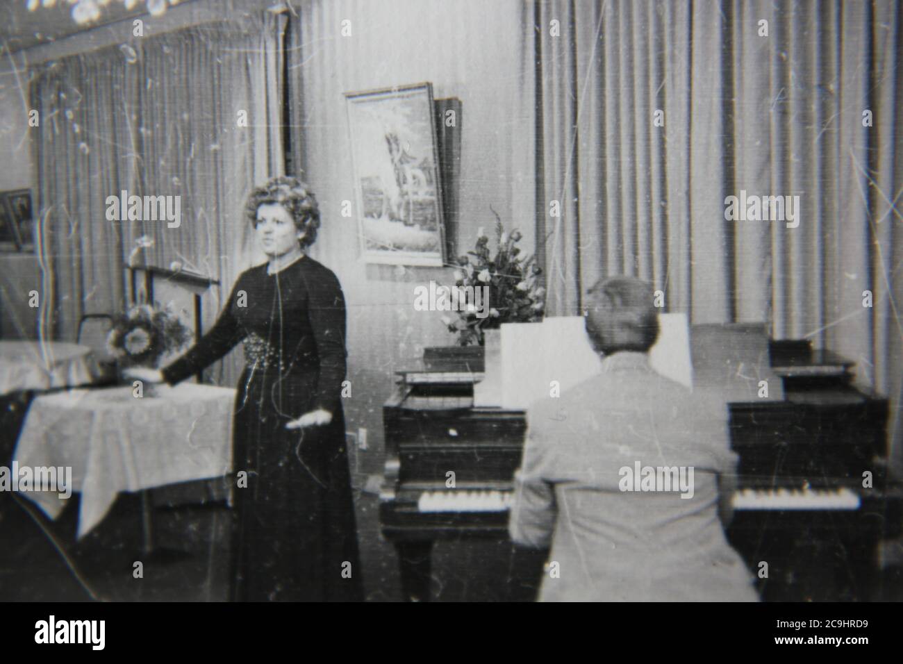 Fine 1970s vintage black and white photography of a lady singer giving ...