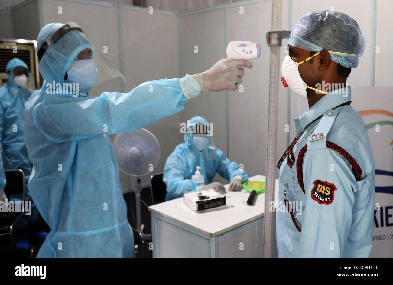 A Health Worker wearing Personal Protective Equipment (PPE) thermal ...