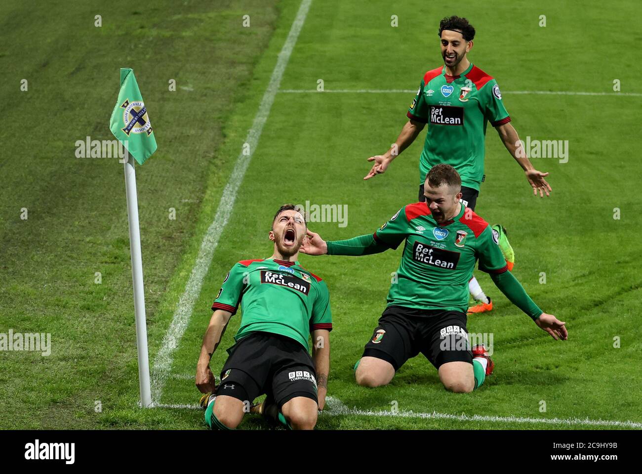Glentoran's Robbie McDaid (left) celebrates scoring his side's second ...