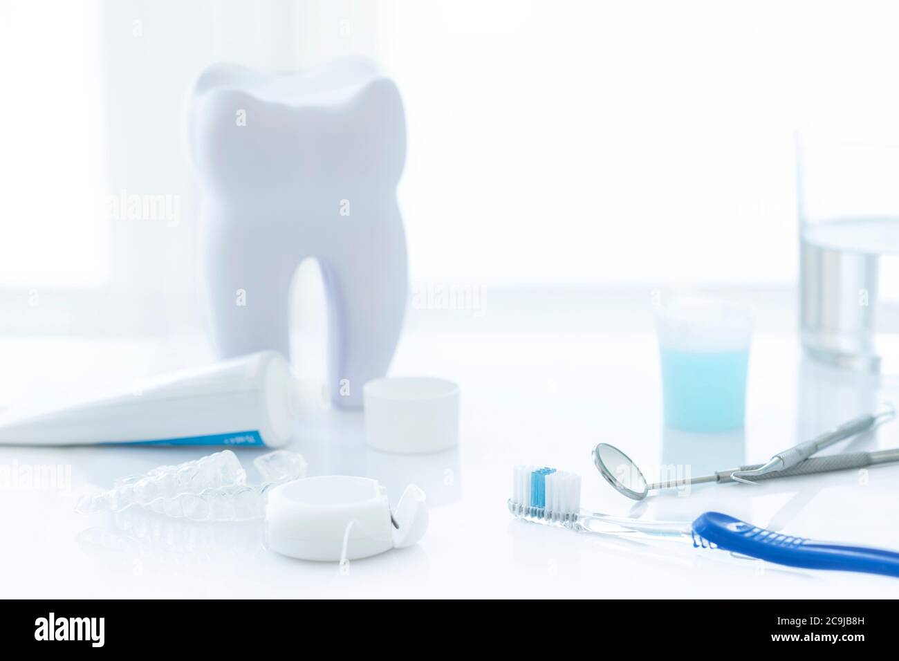 Dental equipment against a white background Stock Photo - Alamy