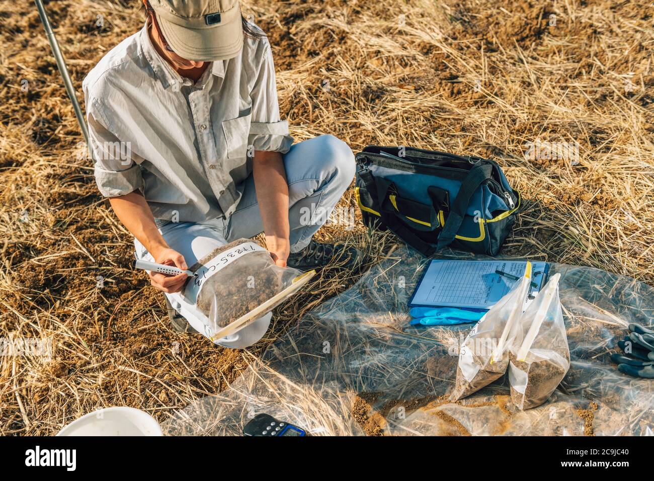 Organic soil certification inspector marking sample Stock Photo - Alamy