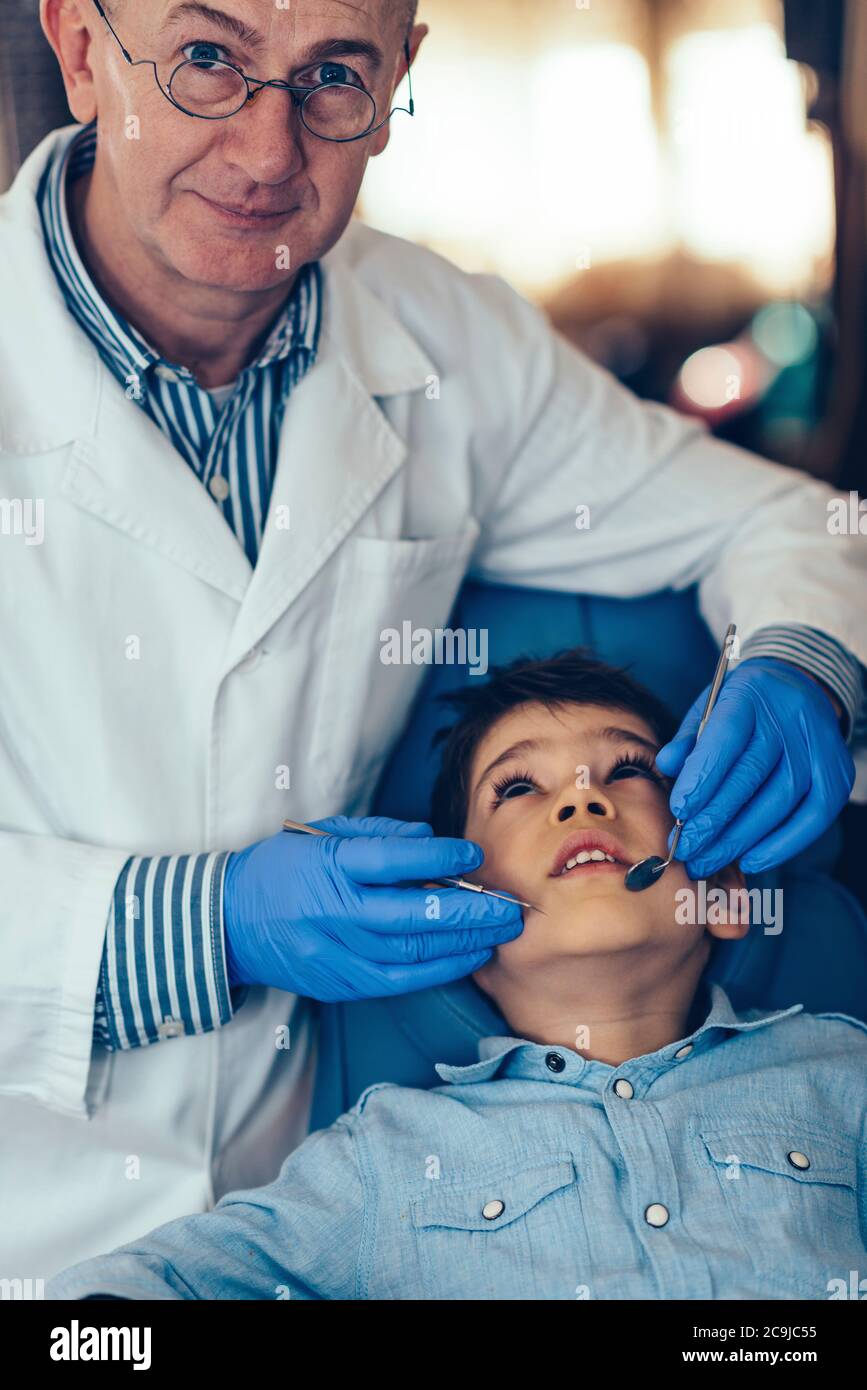 Young boy having dental check-up Stock Photo - Alamy