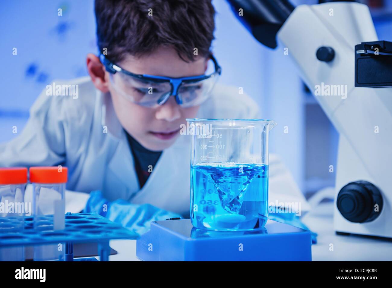 Boy doing science experiment hi-res stock photography and images - Alamy