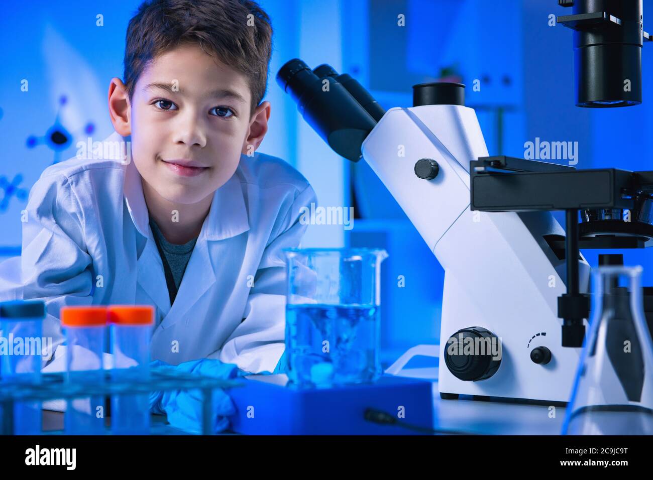 Schoolboy doing science experiment Stock Photo - Alamy