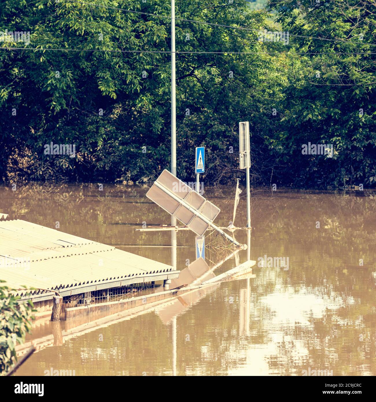 Flooded house roof hi-res stock photography and images - Alamy