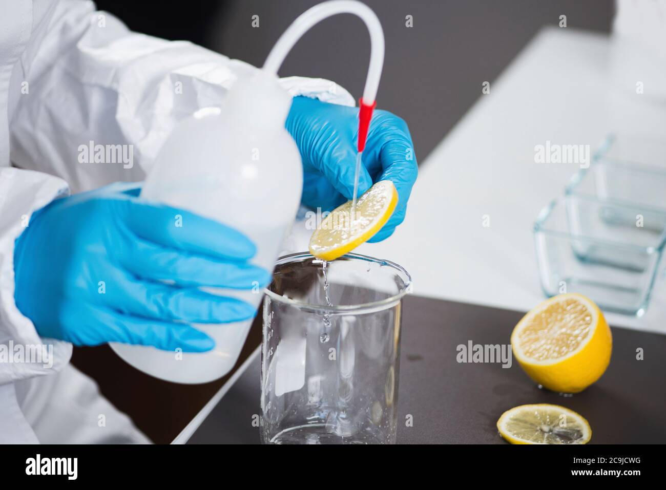Food safety inspector testing fruit Stock Photo - Alamy
