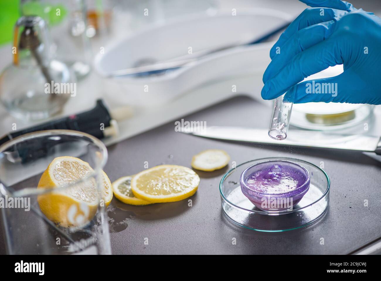 Food safety inspector testing fruit Stock Photo - Alamy