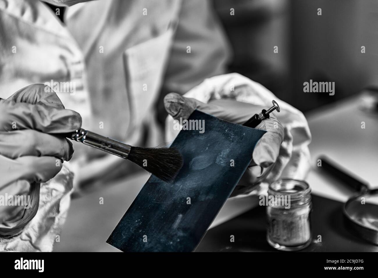 Forensic science investigator collecting fingerprints Stock Photo - Alamy
