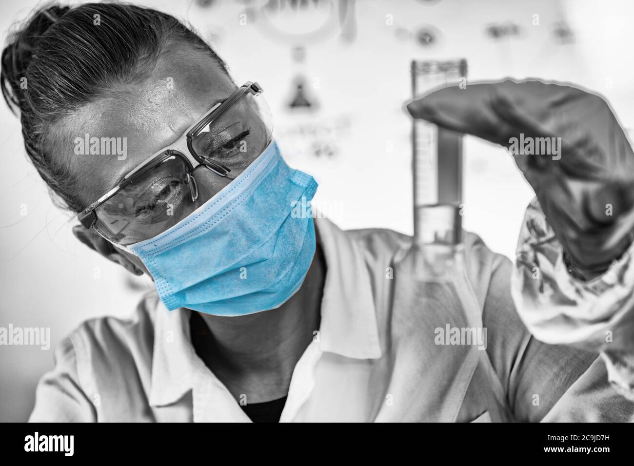 Forensic Science Laboratory. Forensic Scientist examining hair, looking ...