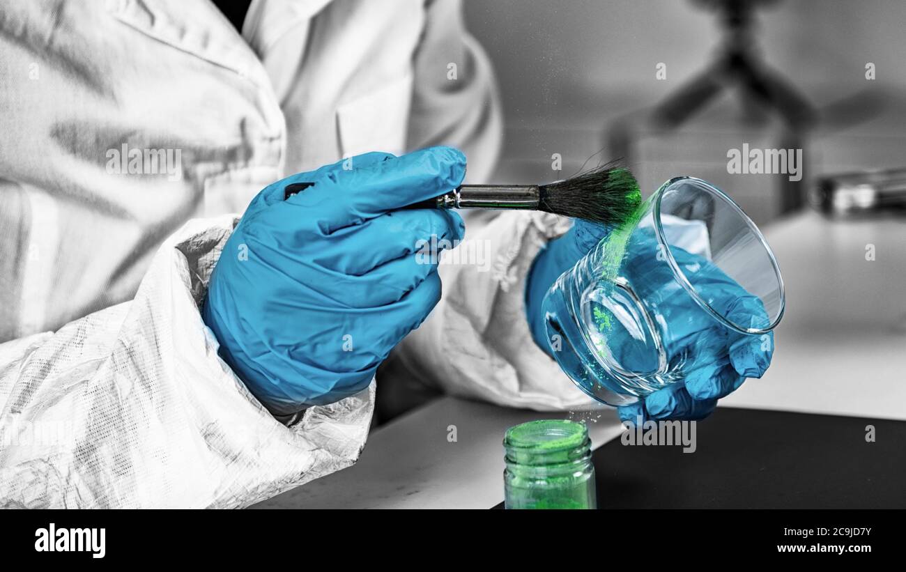 Forensic Evidence examination. Police laboratory analyst examining ...