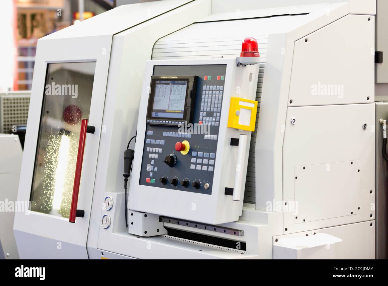 Automatic lathe machine Stock Photo - Alamy