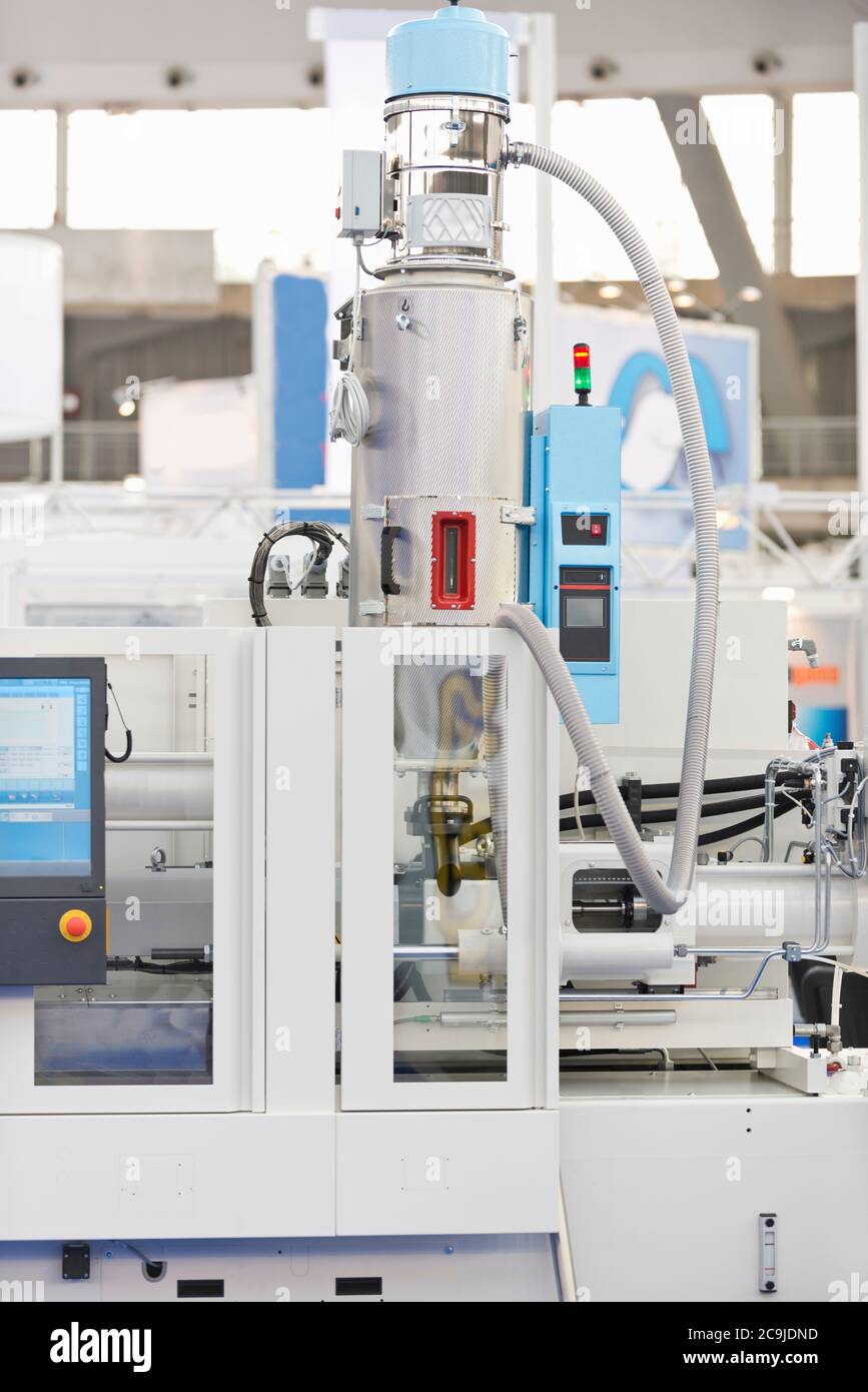 Injection moulding machine Stock Photo - Alamy