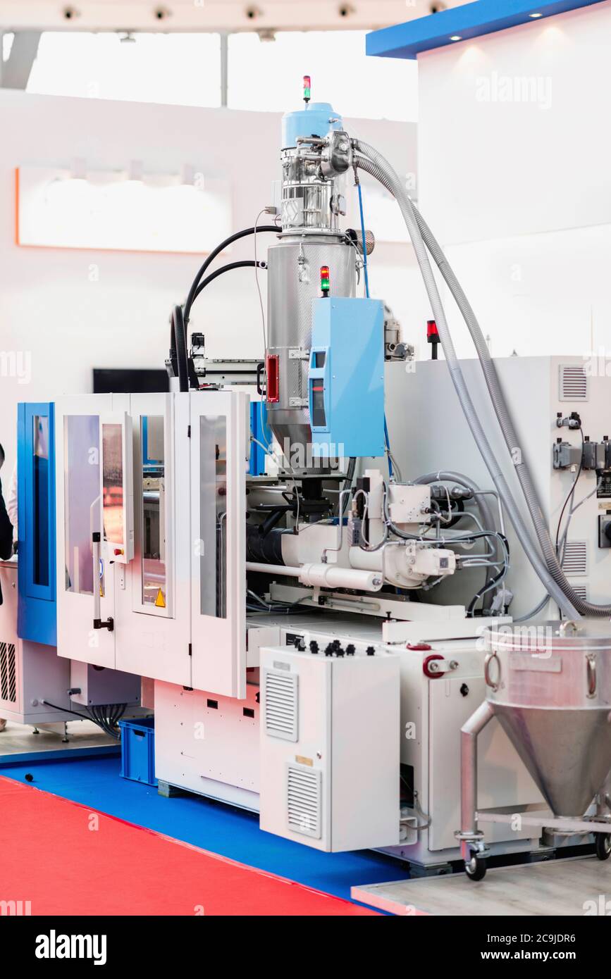 Injection moulding machine in a high tech industrial facility Stock ...