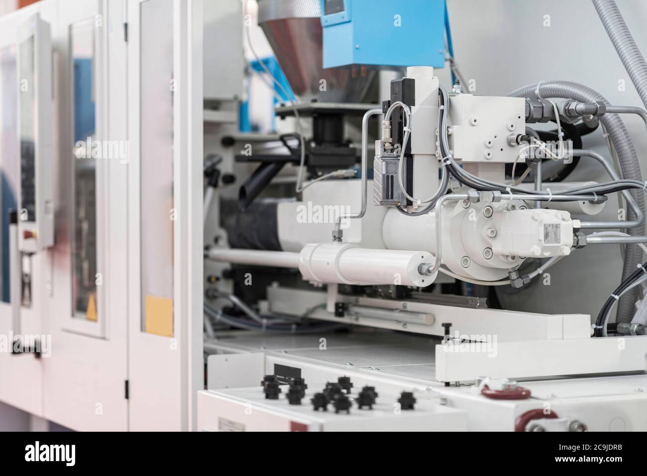 Injection moulding machine in a high tech industrial facility Stock ...