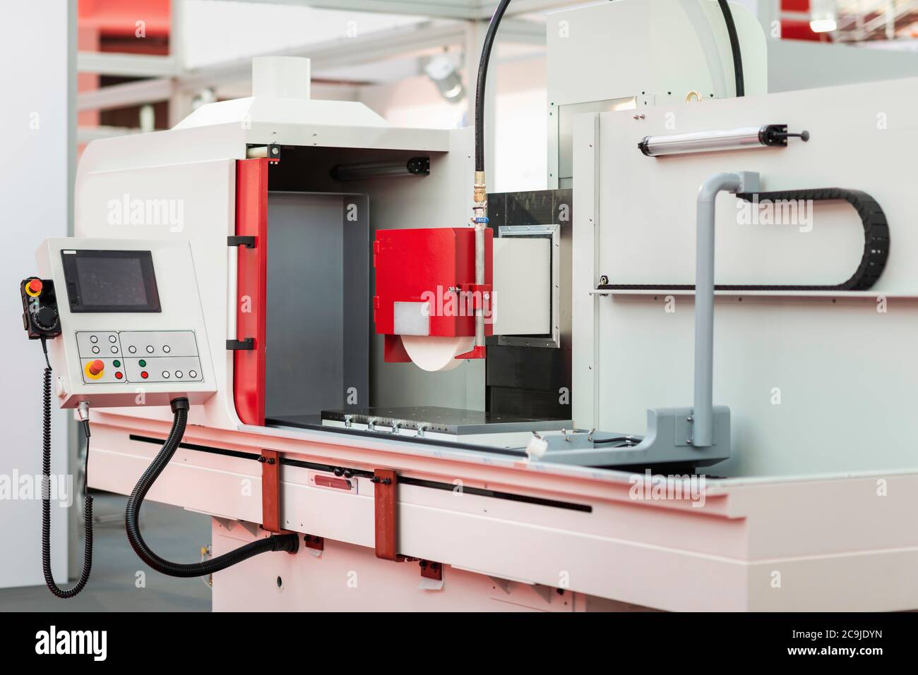 Programmable industrial surface grinding machine Stock Photo - Alamy