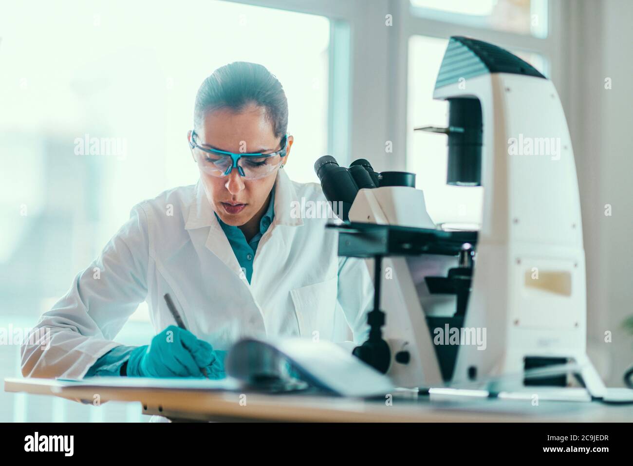 Healthcare scientist taking sample hi-res stock photography and images ...