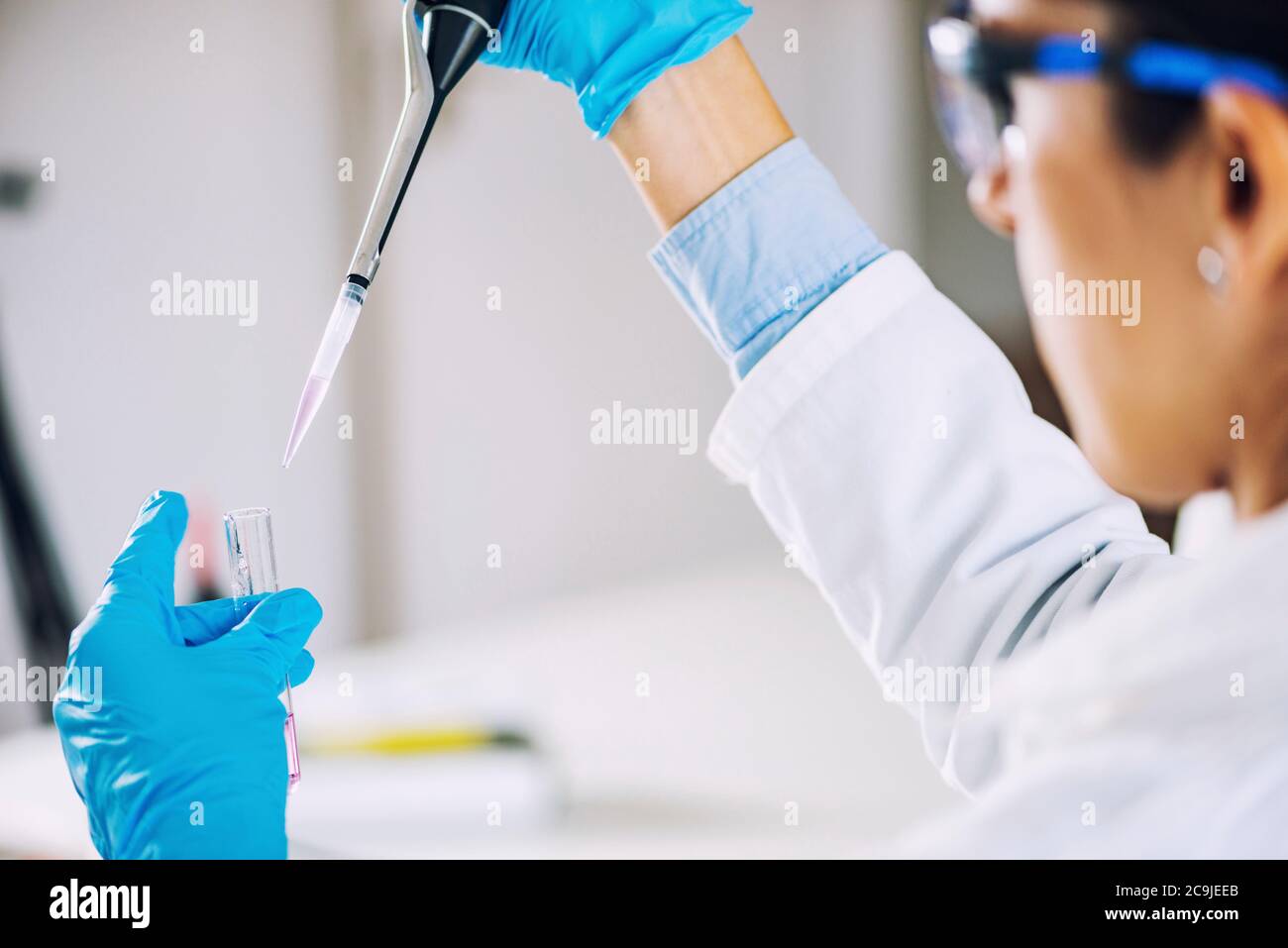 Using micro pipette Stock Photo - Alamy