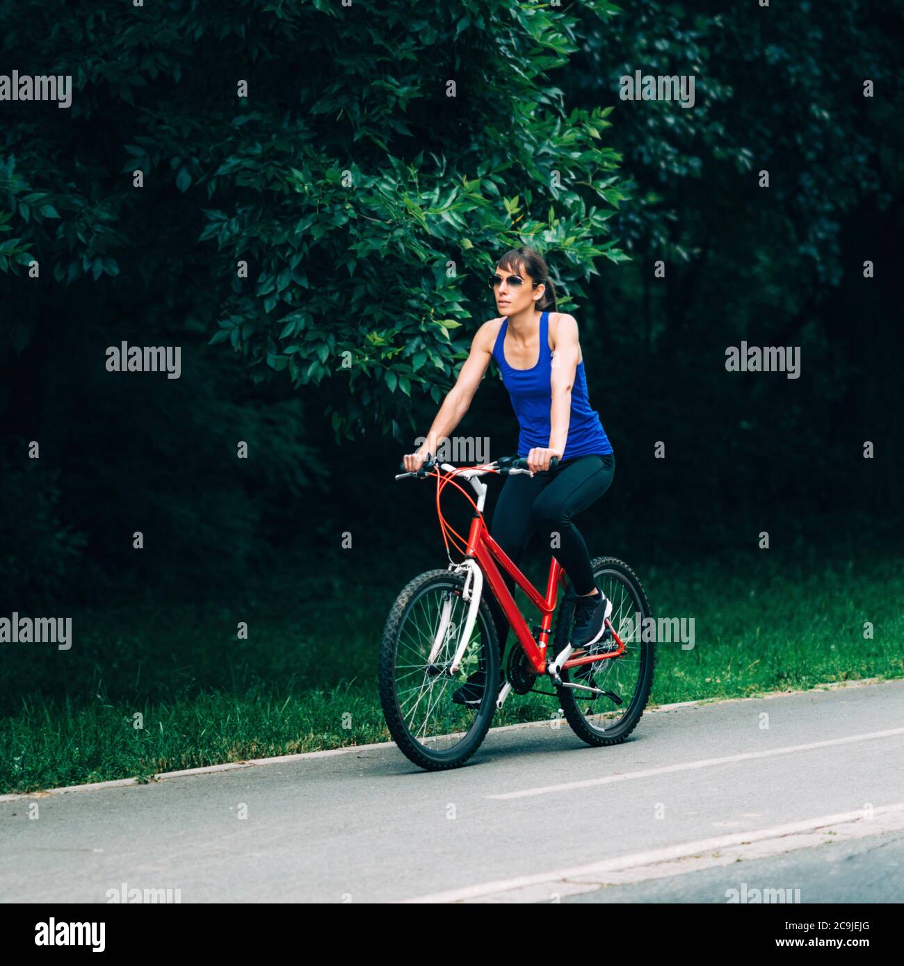 Cycling in a park hi-res stock photography and images - Alamy