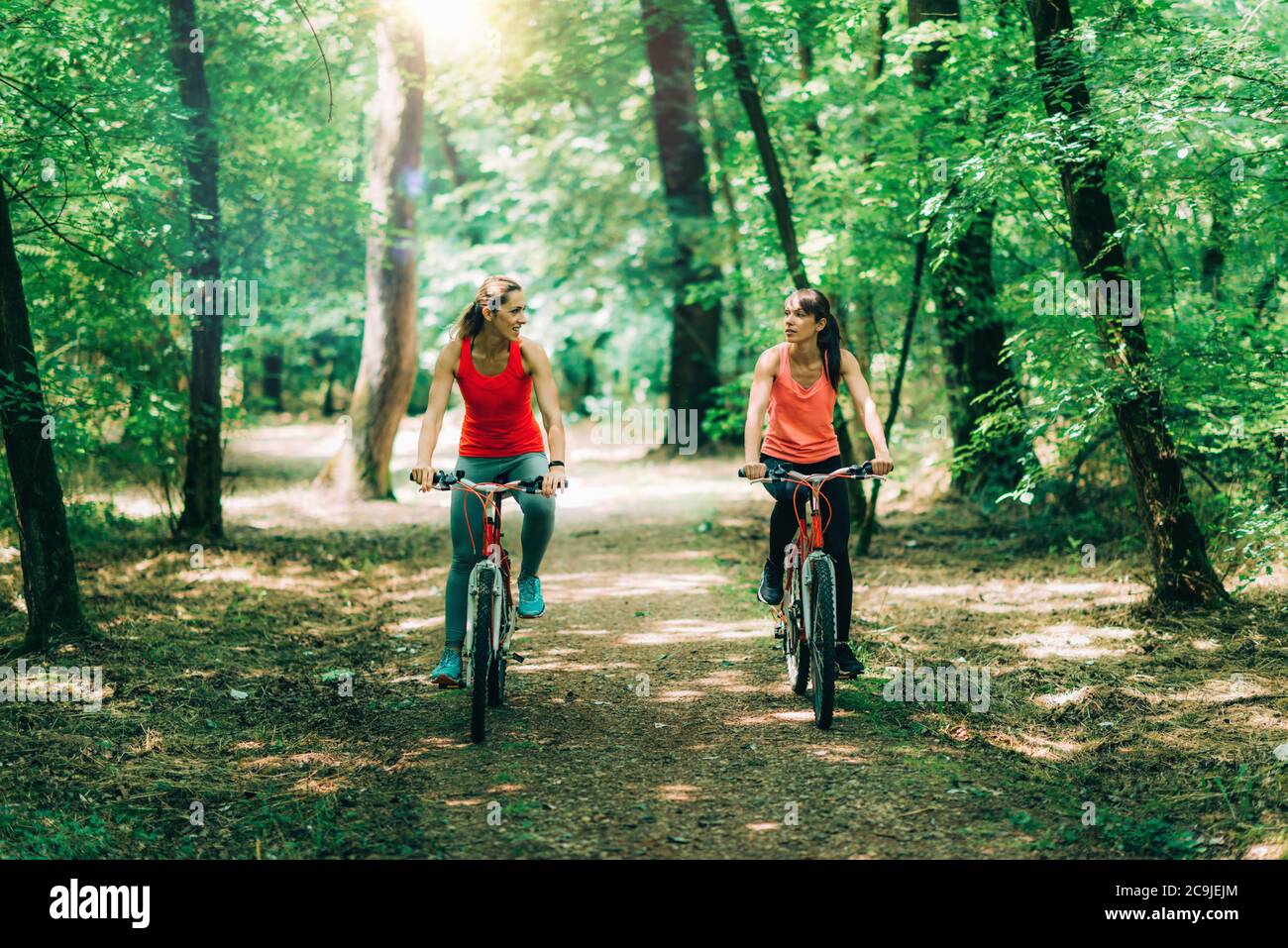 Two women summer bikes hi-res stock photography and images - Alamy