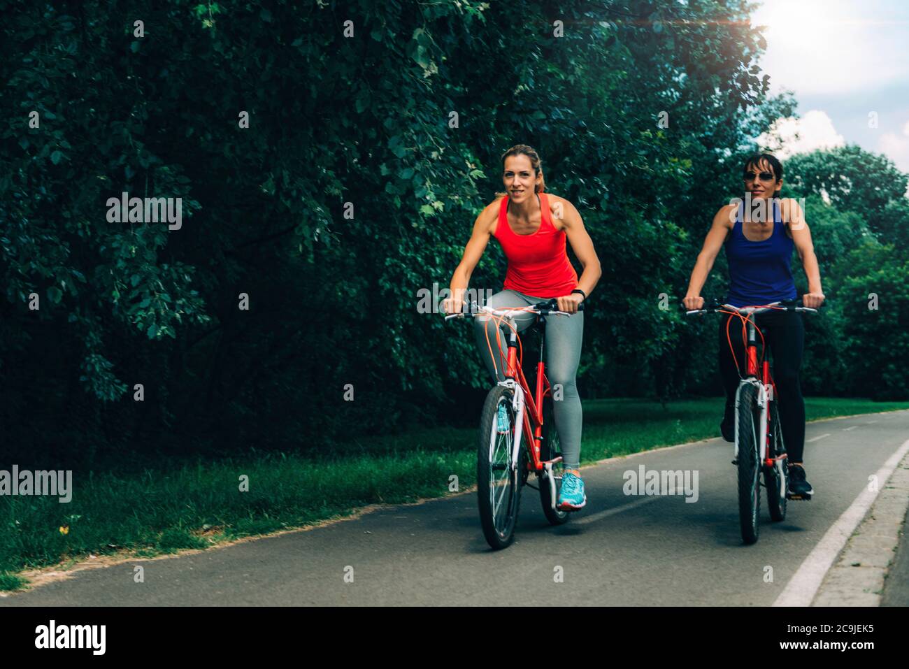 Women cycling together hi-res stock photography and images - Alamy