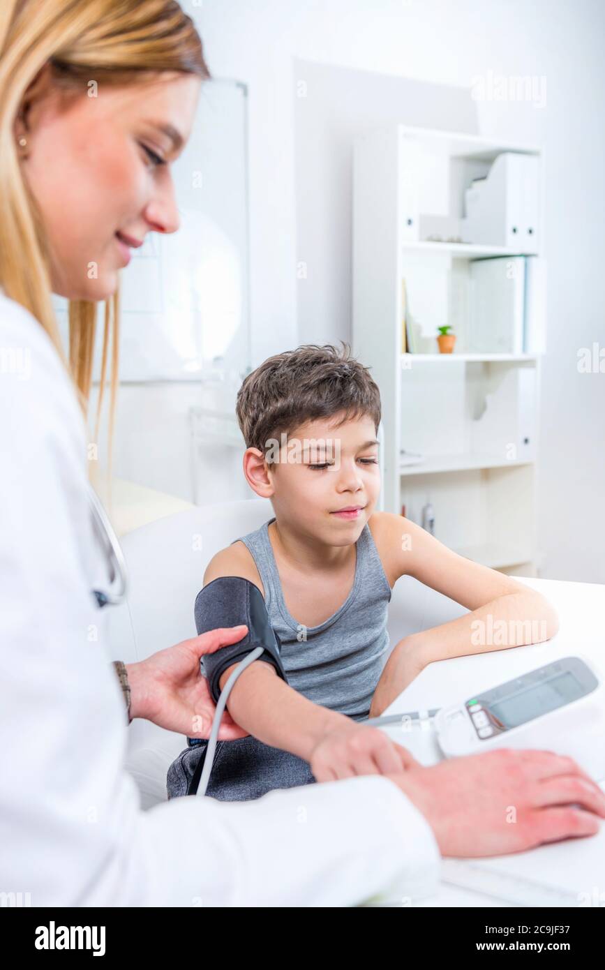 Blood pressure check child hi-res stock photography and images - Alamy