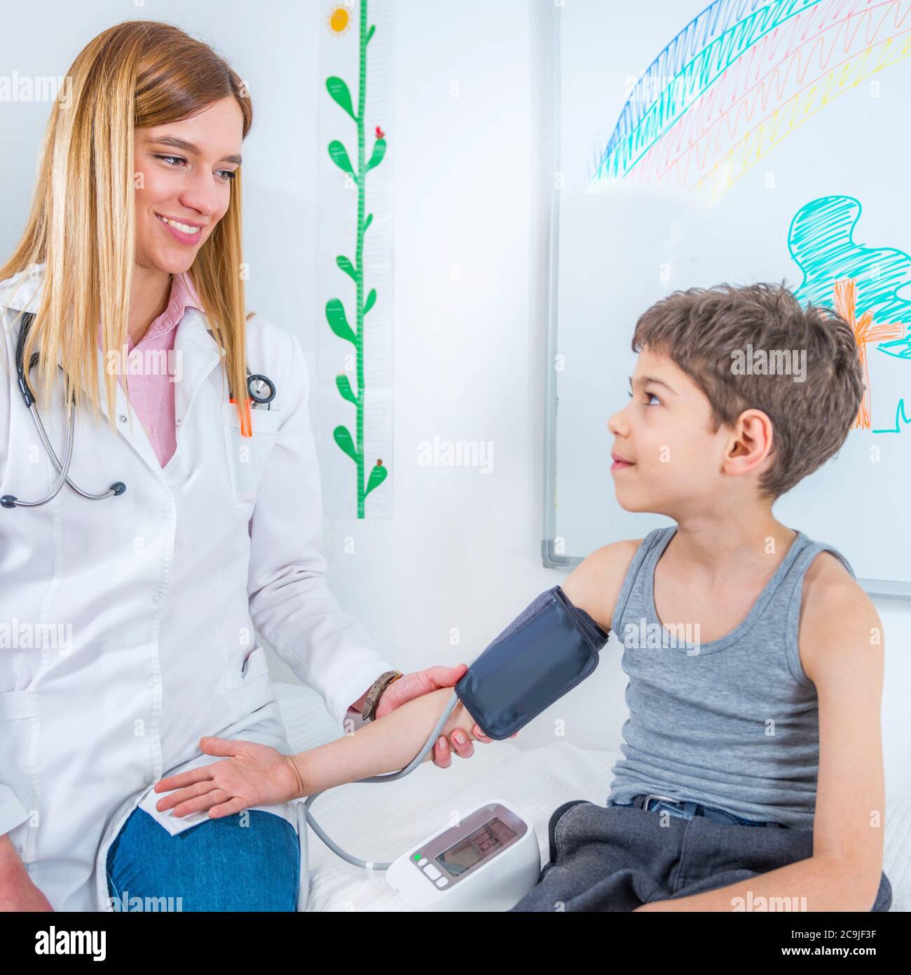 Blood pressure check child hi-res stock photography and images - Alamy